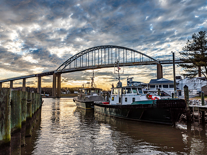 Dramatic skies, working boats, and that bridge—pure Eastern Shore poetry. This scene has probably launched a thousand Instagram posts and at least as many daydreams.