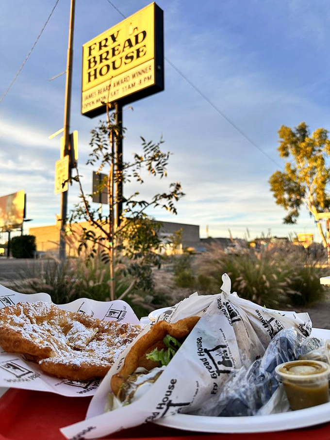 Sunset dining at its finest! Powdered sugar fry bread and a savory taco create the perfect sweet-and-savory combo under the Phoenix sky.
