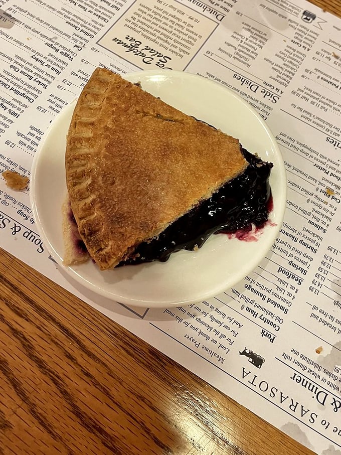 This blueberry pie doesn't need Instagram filters. Deep purple filling bursts with wild berry flavor that no social media post could possibly capture.