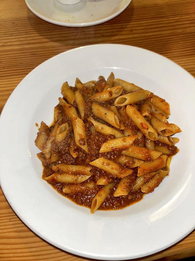Penne Bolognese that makes you wonder if your Italian grandmother has been secretly moonlighting in Portland. 