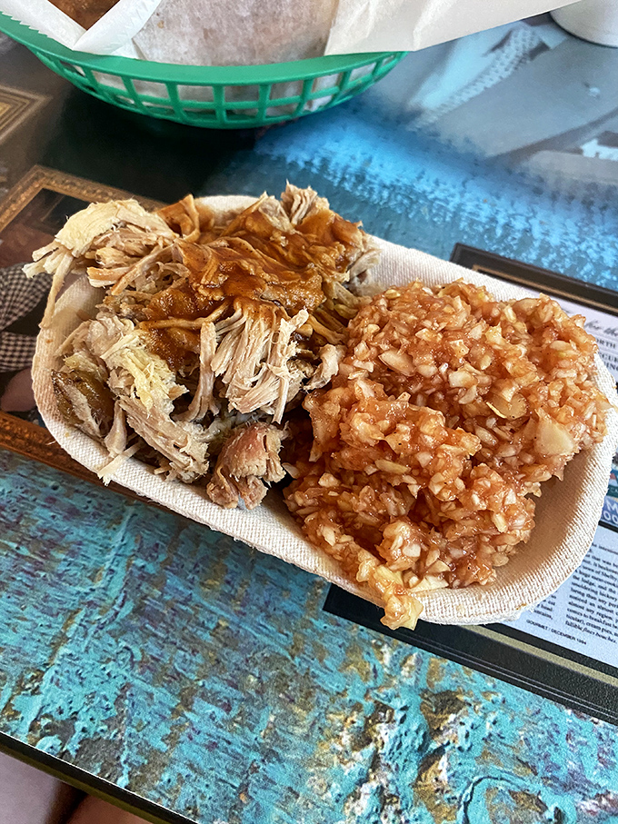 Every strand of that hand-pulled pork tells a story of patience, hickory smoke, and family tradition that spans three generations of barbecue artistry.