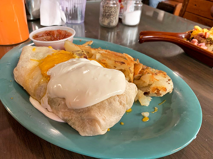 This breakfast burrito isn't just food&mdash;it's architectural genius. Look at that sour cream crown! Michelangelo would weep.