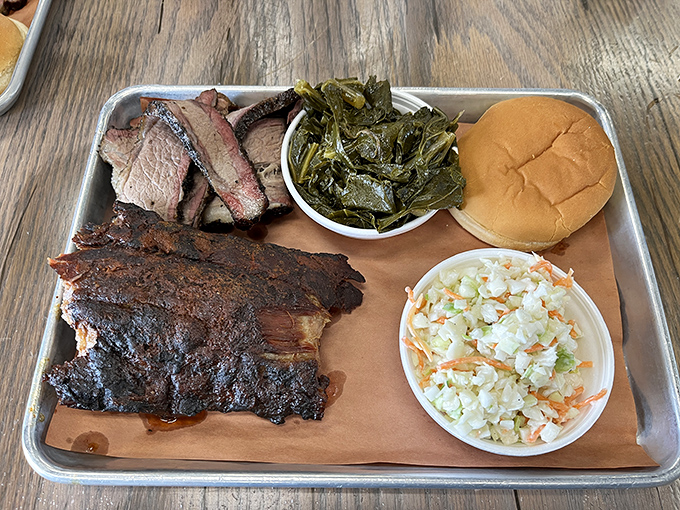 Brisket with that perfect smoke ring alongside ribs that surrender from the bone. This is what barbecue dreams are made of.