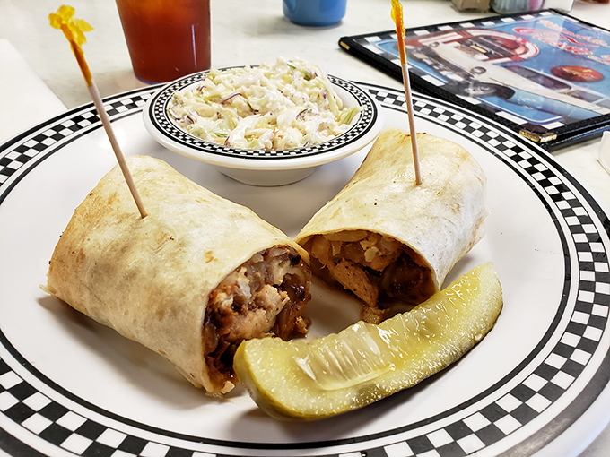 Breakfast burritos: where tortillas fulfill their highest purpose. That pickle on the side isn't just garnish&mdash;it's the palate cleanser you didn't know you needed.