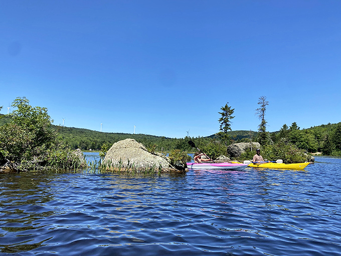 Kayaking adventures await! Navigating between granite sentinels that have stood watch since the last ice age retreated from New Hampshire.