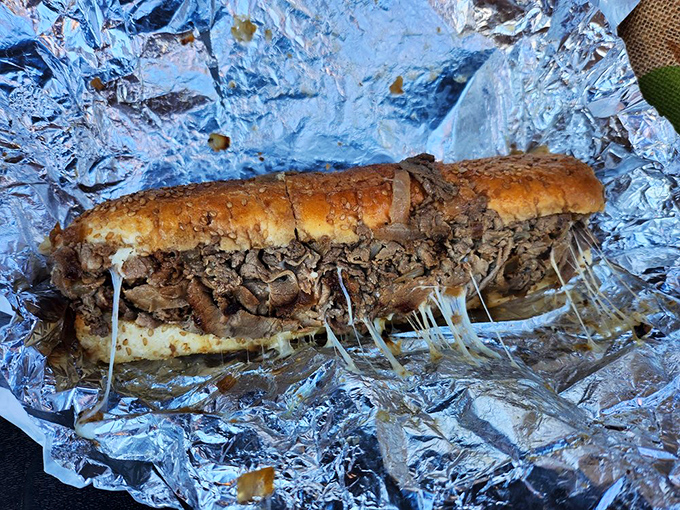 Behold the star of the show&mdash;tender chopped beef embraced by melted cheese in a perfect roll. Poetry in sandwich form.