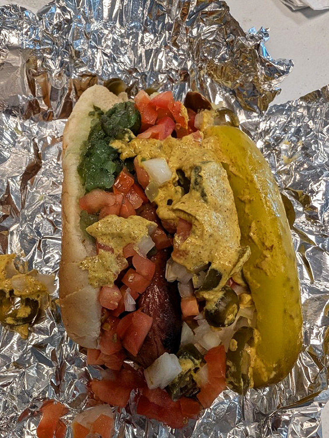 Mexican-style masterpiece with vibrant pico de gallo, jalape&ntilde;os, and a symphony of textures that proves hot dogs know no cultural boundaries.