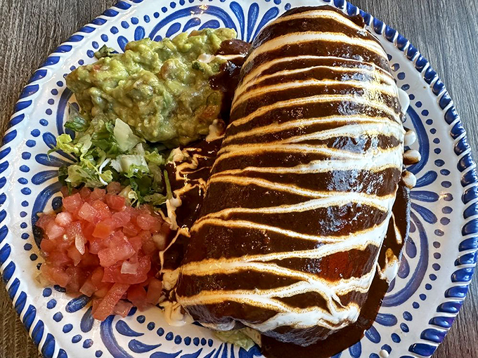 Shrimp tacos that look like they jumped straight from the sea to your plate, topped with the holy trinity of cilantro, onion, and lime.