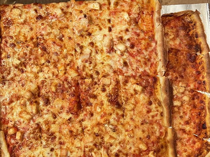 The chicken pizza arrives like a beautiful mosaic of flavors&mdash;proof that sometimes the classics need no improvement. 