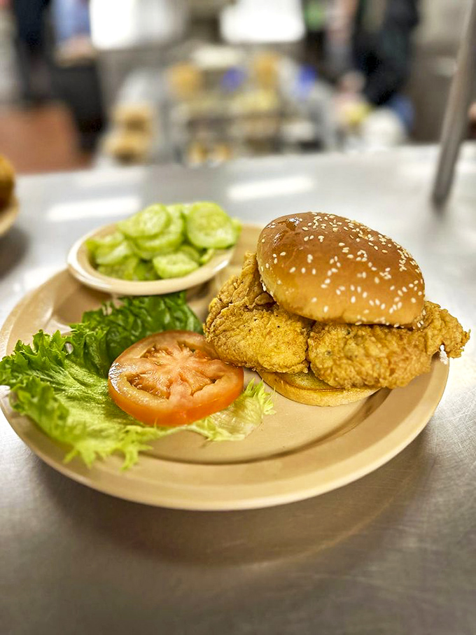 Behold the chicken sandwich that asks, "Why be ordinary?" Golden-fried perfection meets garden-fresh toppings in a handheld masterpiece that demands both hands.
