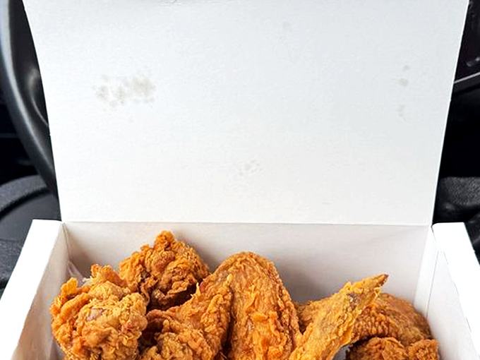 The humble takeout box, transformed into a treasure chest of golden-brown joy. Some people see cardboard &ndash; I see a portal to flavor paradise.