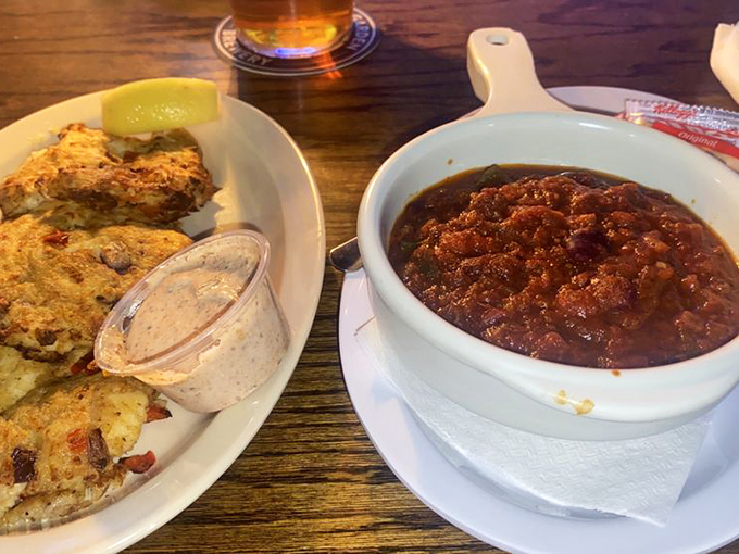 The ultimate comfort food pairing: golden crab cakes meet hearty chili. Like reuniting old friends who always bring out the best in each other.