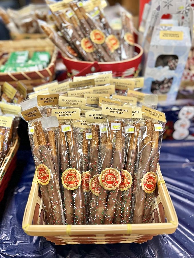 Chocolate-dipped pretzels lined up like delicious soldiers, each wearing the proud "Since 1891" medallion that says "we've been doing this longer than you've been alive."