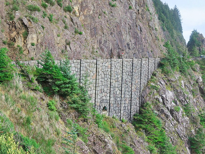 Engineering meets nature along the Oregon coast, where retaining walls protect Highway 101 from the persistent Pacific. 