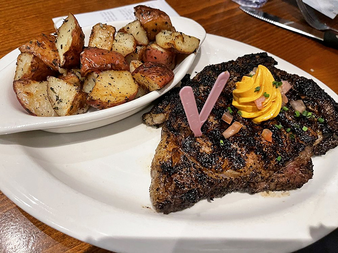 Coffee-rubbed ribeye with roasted potatoes&mdash;proof that sometimes the simplest combinations create the most profound experiences.