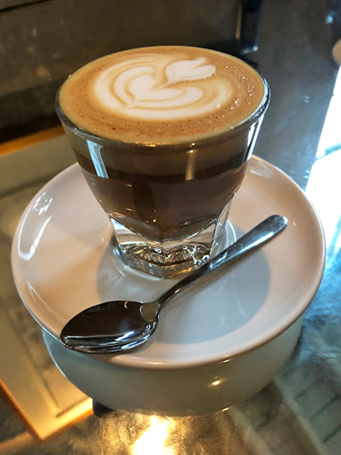 This cappuccino isn't just a drink, it's a tiny masterpiece in a cup. The foam-to-espresso ratio here is what coffee dreams are made of.