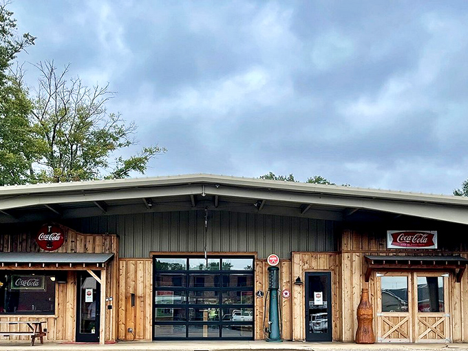This rustic wooden structure isn't just a building &ndash; it's a time machine with Coca-Cola signs that transport you back to simpler days of soda jerks and jukebox tunes.
