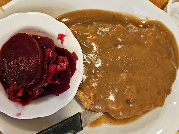The perfect pairing: country fried steak swimming in savory gravy alongside pickled beets that cut through the richness beautifully. 
