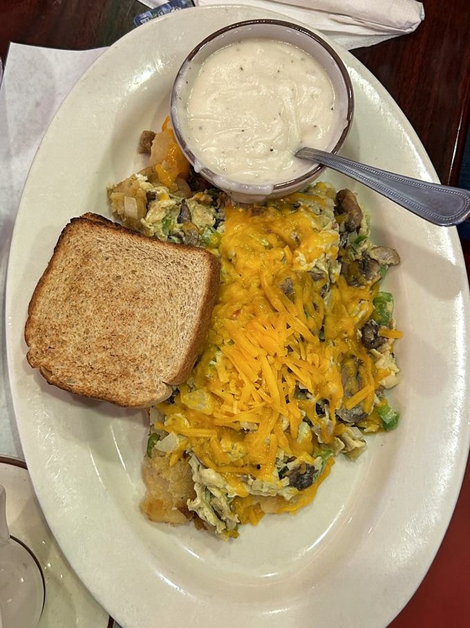 That's not just cheese on hashbrowns&mdash;it's morning sunshine in edible form. The side of gravy is basically a separate meal.