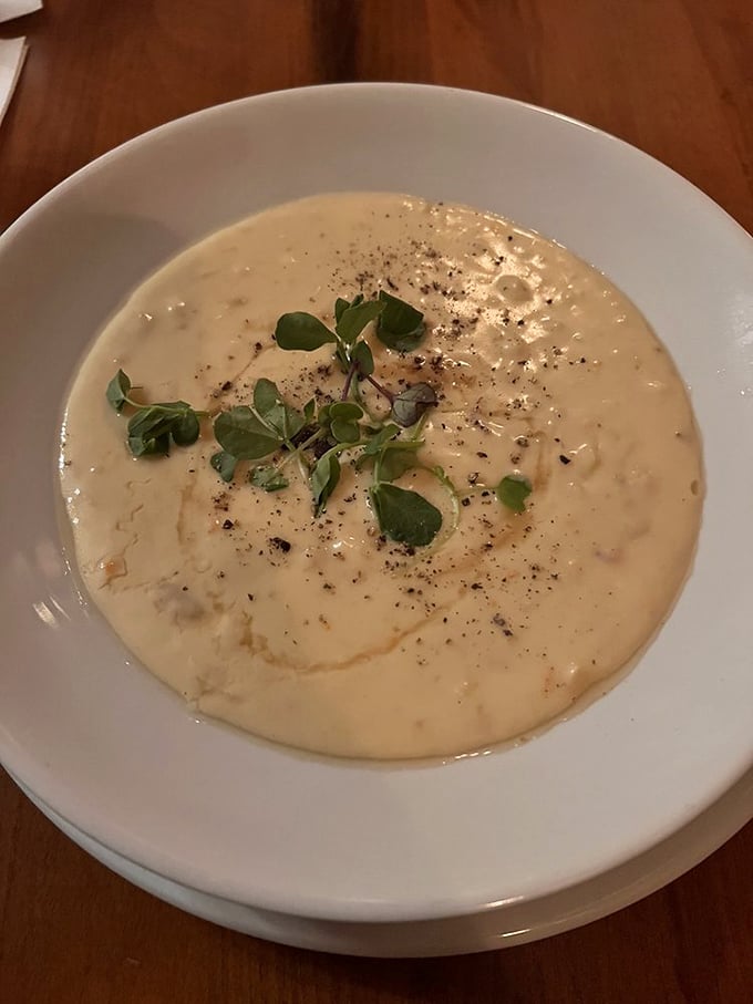 Creamy, dreamy, and worth every calorie. The iconic she-crab soup comes garnished with fresh microgreens that add color and bring out the delicate seafood flavor.