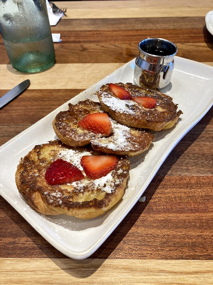 Croissant French toast: where buttery pastry meets custard bath. The French would approve of this magnificent cultural collaboration.