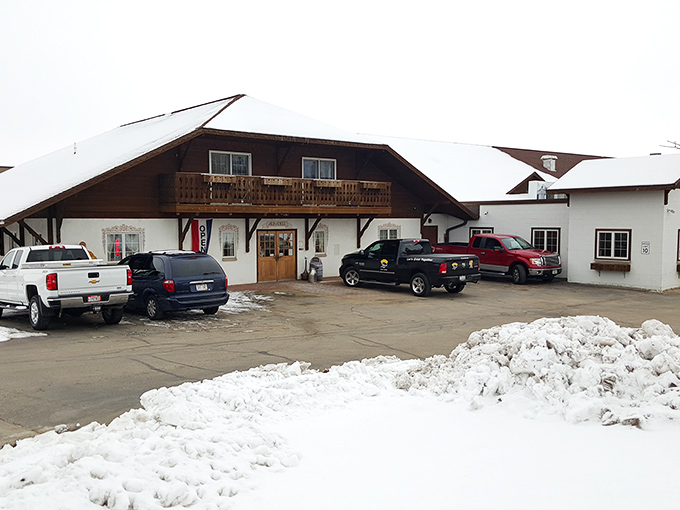 Swiss-inspired architecture covered in snow &ndash; because nothing says "authentic cheese experience" like buildings that look like they were imported directly from the Alps. 