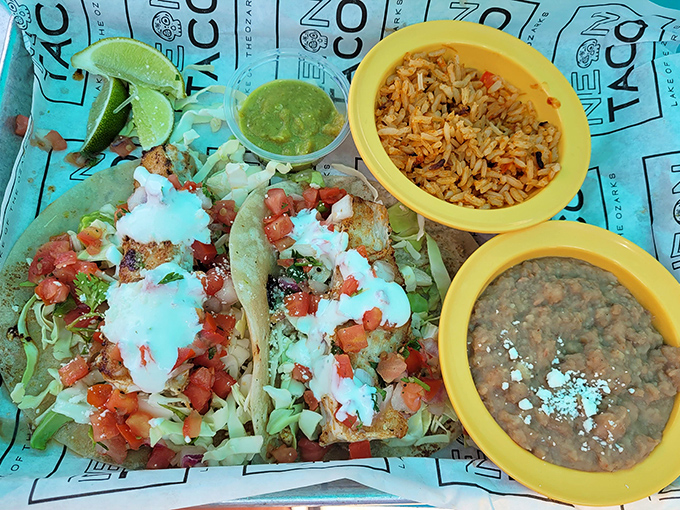 A perfect trio: golden fish tacos, lime-kissed rice, and beans that didn't come from any can &ndash; this is lake dining elevated.