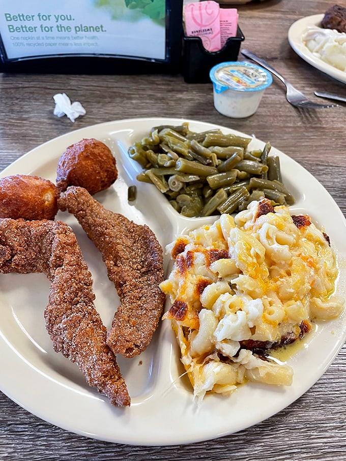 Southern trifecta: fried catfish, mac and cheese that could make a cardiologist weep, and green beans cooked properly&mdash;which means with pork.