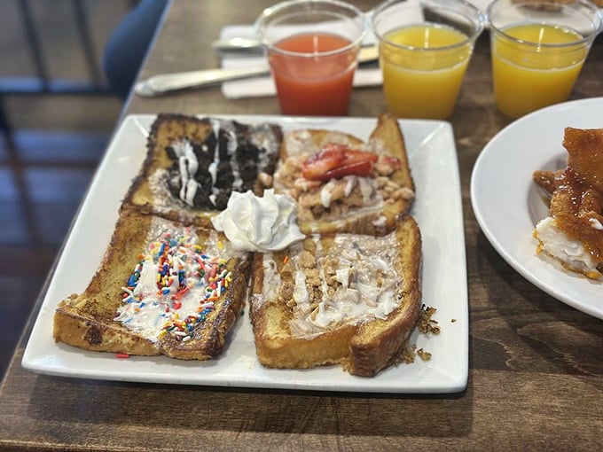 The French Toast Flight: where indecision becomes a virtue. Four different varieties on one plate is basically brunch's greatest hits album.