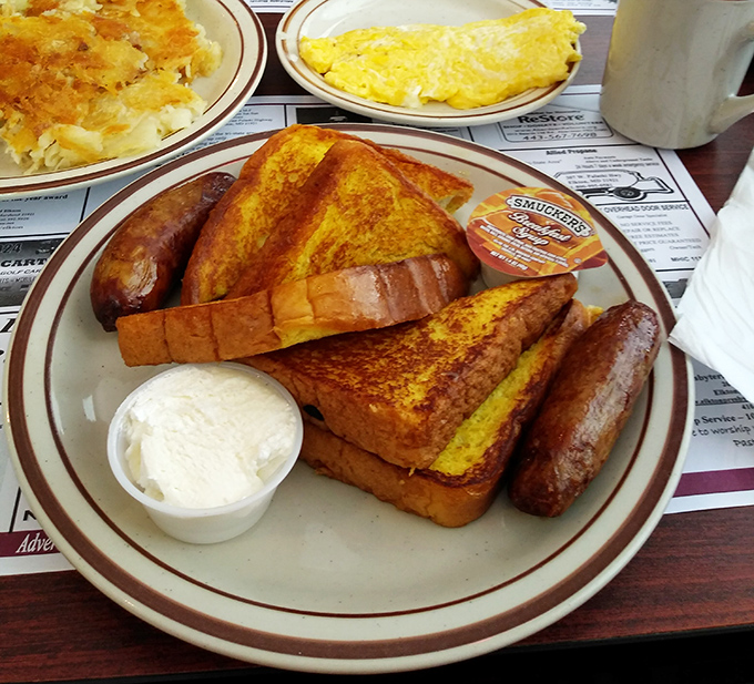 French toast and sausage links that would make breakfast-skippers repent their ways. This plate doesn't just break fasts; it demolishes them.