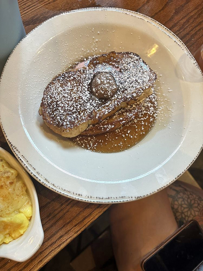 Simplicity perfected. The powdered sugar dusting isn't hiding imperfections&mdash;it's celebrating breakfast perfection underneath.