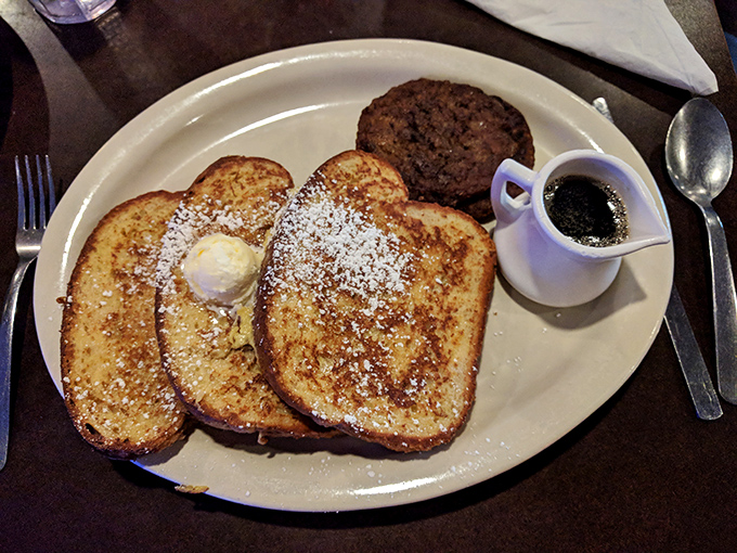 Classic French toast with a pat of butter melting into those golden slices&mdash;proof that breakfast simplicity can still be an art form.