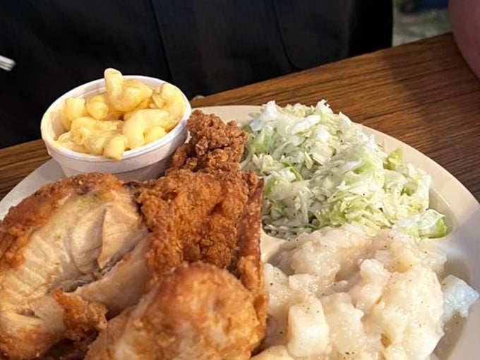 A plate that tells Kansas' story better than any history book. Crispy chicken, creamy sides, and the unspoken rule that calories don't count when the food's this good.