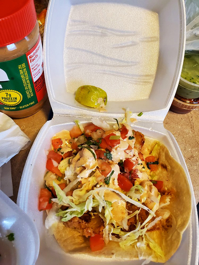 The holy trinity of taco perfection: tender fish, fresh toppings, and that crucial squeeze of lime. Simplicity that somehow manages to be revolutionary.