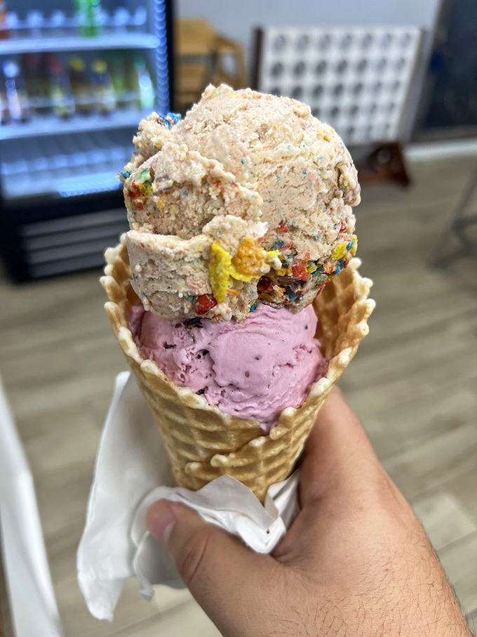 A tower of contrasts: fruity cereal crunch meets smooth berry creaminess. Architecture you can eat.