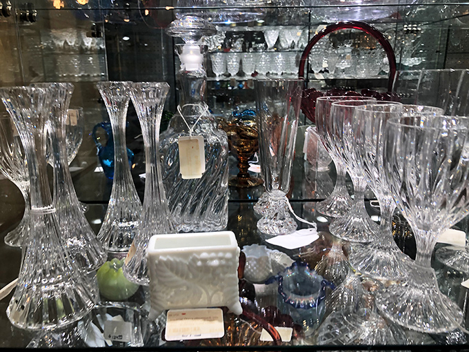 Crystal and glassware that survived decades of dinner parties and celebrations. Each piece catching light and throwing tiny rainbows like silent fireworks.
