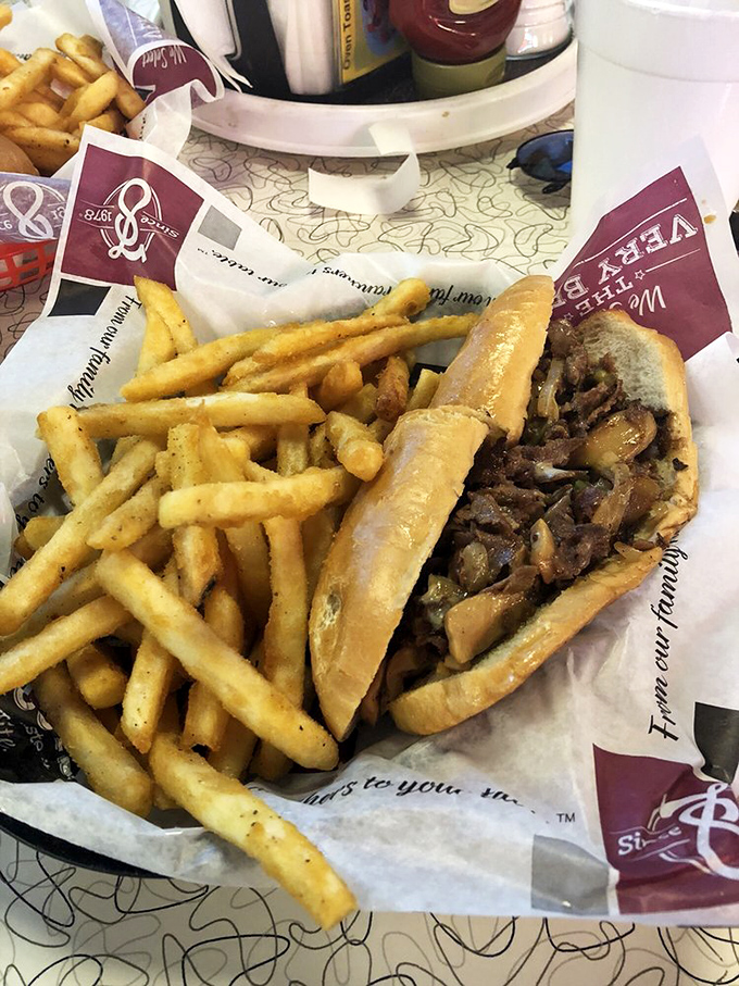 Half a cheesesteak means you're either practicing admirable restraint or saving room for dessert&mdash;either way, it's a beautiful sight.