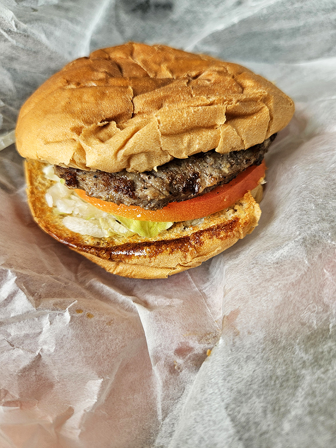 This isn't just a burger&mdash;it's a perfectly proportioned masterpiece of beef, vegetables, and toasted bun that demands to be savored.