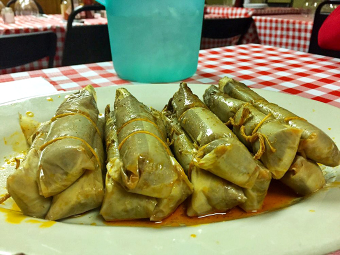 Delta tamales lined up like soldiers ready for delicious battle. These aren't just wrapped in paper&mdash;they're wrapped in Mississippi culinary history.