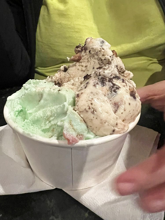 A study in contrasts: mint green alongside creamy brown with mix-ins galore. Proof that opposites really do attract in the ice cream world.