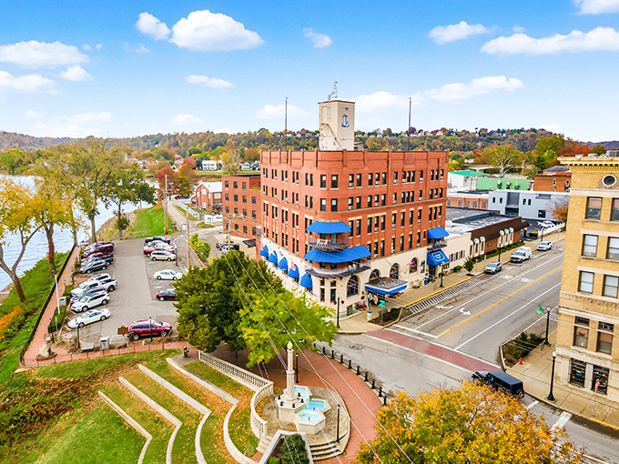 The Lafayette Hotel stands as Marietta's riverside sentinel, its distinctive brick fa&ccedil;ade and blue awnings beckoning travelers just as they have for generations.