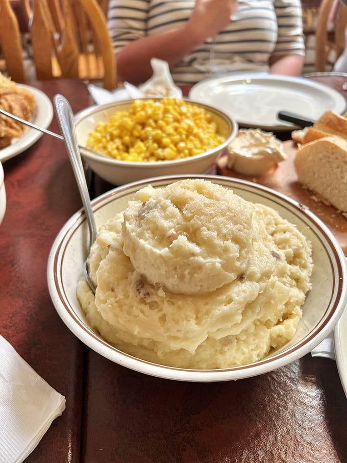 Behold the main attraction: mashed potatoes so perfectly whipped they make clouds look lumpy by comparison. Worth every mile of your journey.