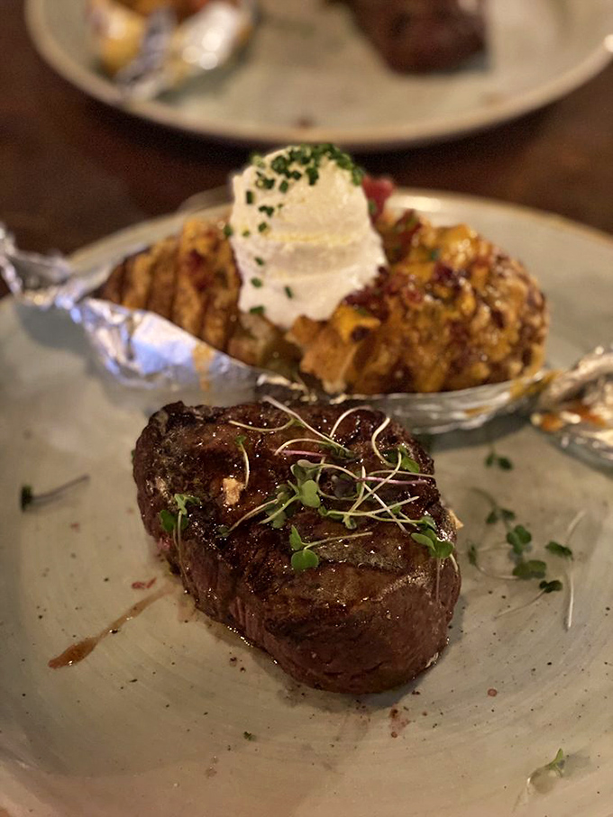 A perfectly seared New York Strip that's dressed to impress. The grill marks are practically autographs from a meat masterpiece.