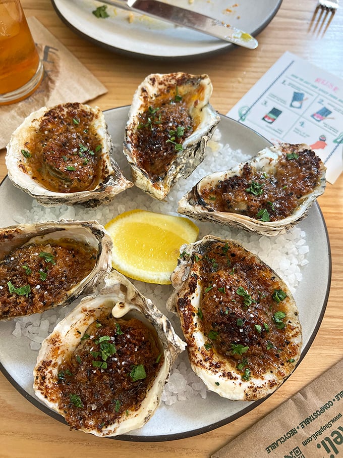 Oysters Rockefeller done right: briny treasures transformed into buttery, herb-crusted morsels that would make the Vanderbilts jealous.
