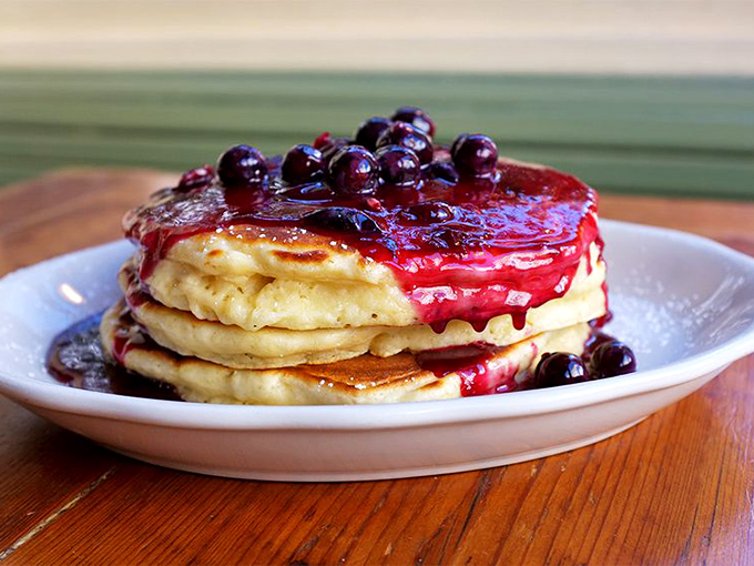 These blueberry pancakes aren't just breakfast, they're an edible art form&mdash;golden discs supporting a berry avalanche that would make Jackson Pollock jealous.