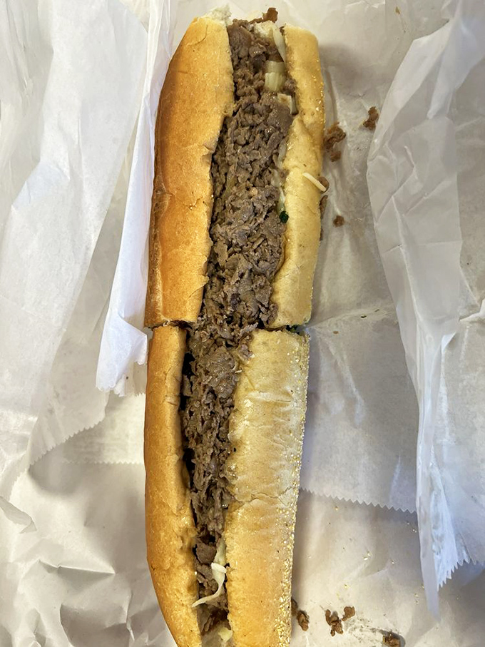 This isn't just a Philly cheesesteak—it's a masterclass in simplicity. Thinly sliced beef, perfectly melted cheese, and bread that deserves its own fan club.