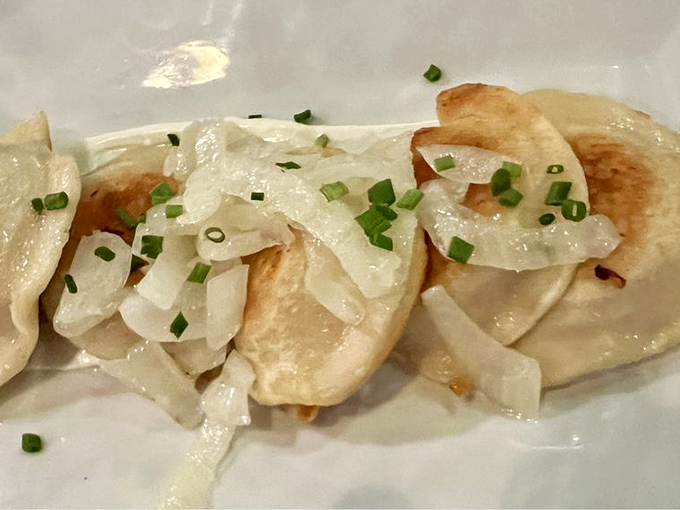 These pillowy pierogies aren't just food&mdash;they're Pittsburgh's love language. Topped with caramelized onions and a dollop of sour cream, they're pure comfort. 