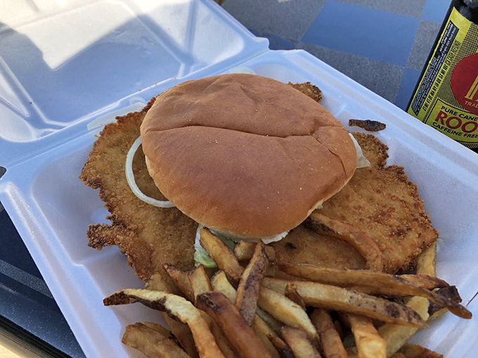 The tenderloin and fries combo: where the sandwich requires strategic planning and the fries provide moral support.