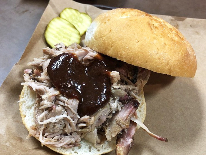 The marriage of pulled pork and sauce that would make Cupid hang up his bow. That pickle slice is the chaperone this romance doesn't need.