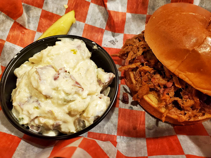 The perfect marriage of potato salad and pulled pork sandwich &ndash; proof that in the barbecue world, side dishes aren't supporting characters, they're co-stars.